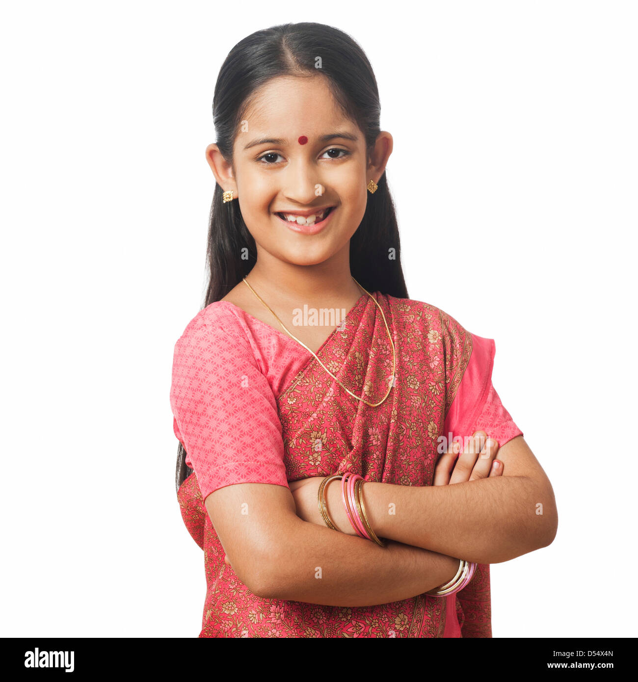 Portrait of a girl imitating like woman smiling with her arms crossed ...