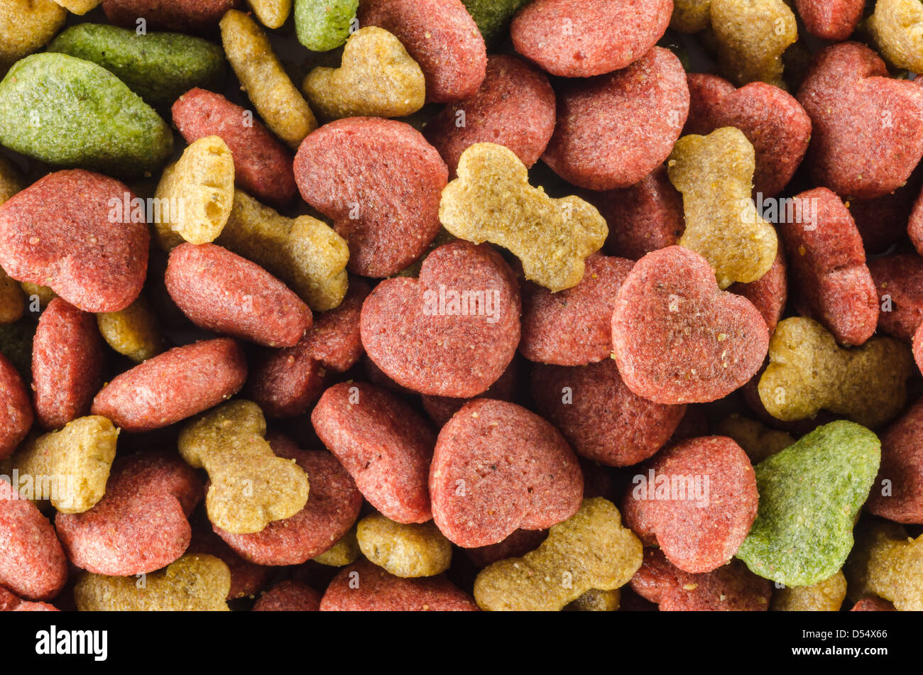 Dog food colorful heart and bone in lovely concept Stock Photo - Alamy