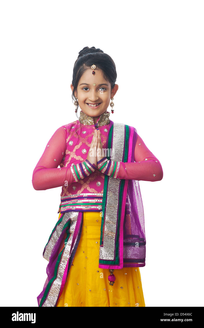 Portrait of a girl imitating like woman greeting on diwali Stock Photo ...