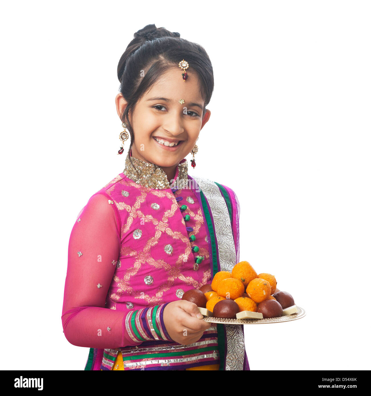 Woman holding plate laddu hi-res stock photography and images - Alamy