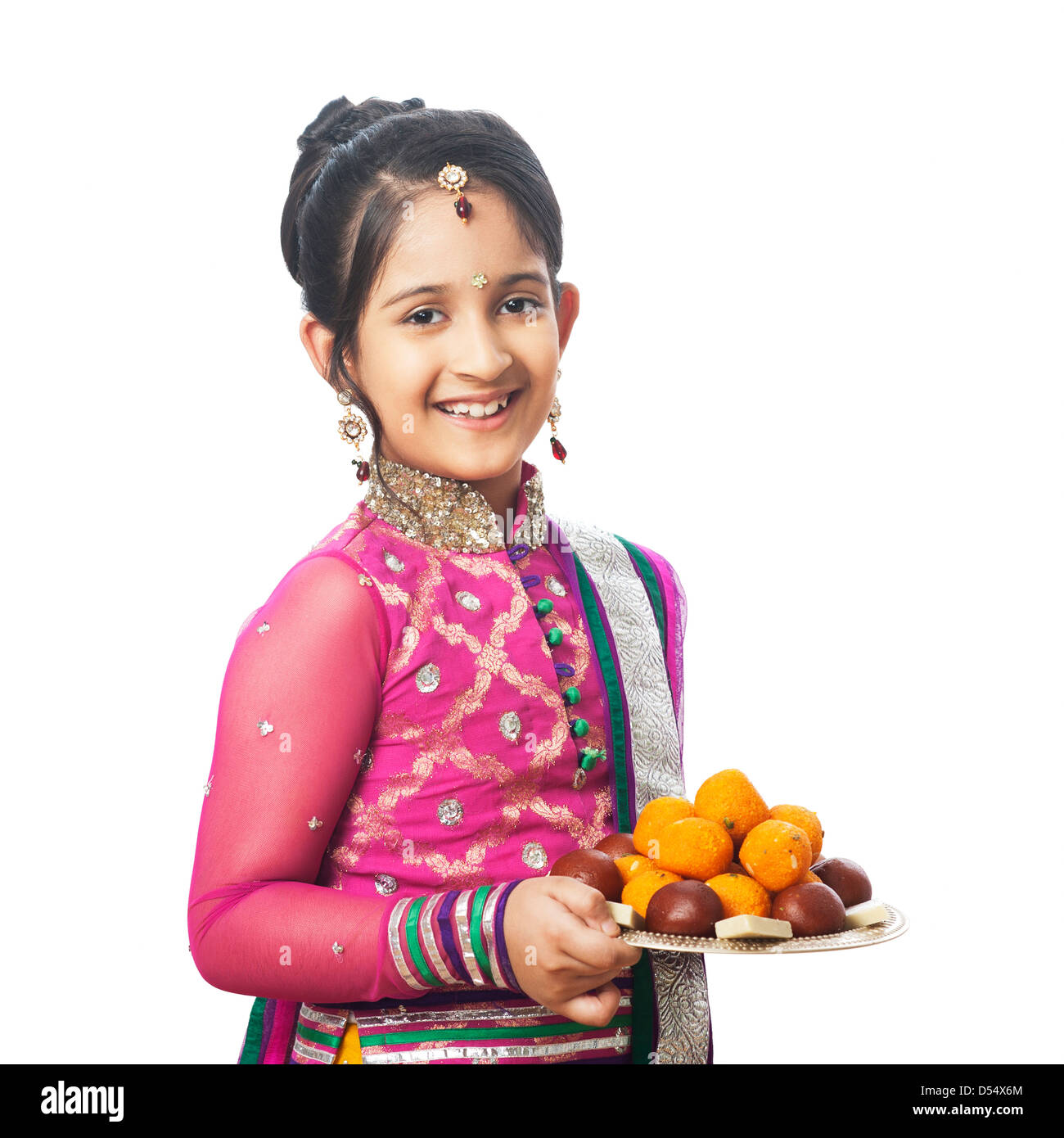 Woman holding plate laddu hi-res stock photography and images - Alamy