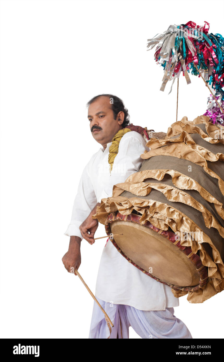 Man playing musical instrument dhol hi-res stock photography and images ...