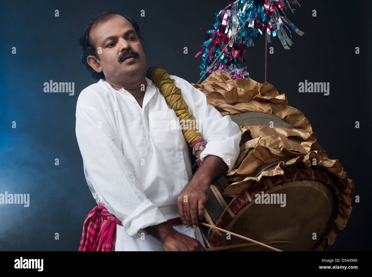 Man playing musical instrument dhol hi-res stock photography and images ...