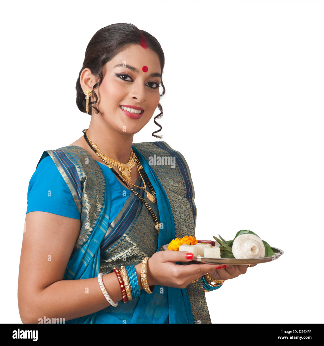 Bengali woman holding pooja thali hi-res stock photography and images ...