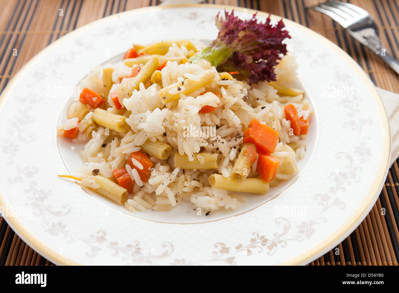 lean boiled rice with vegetable mix, closeup Stock Photo - Alamy