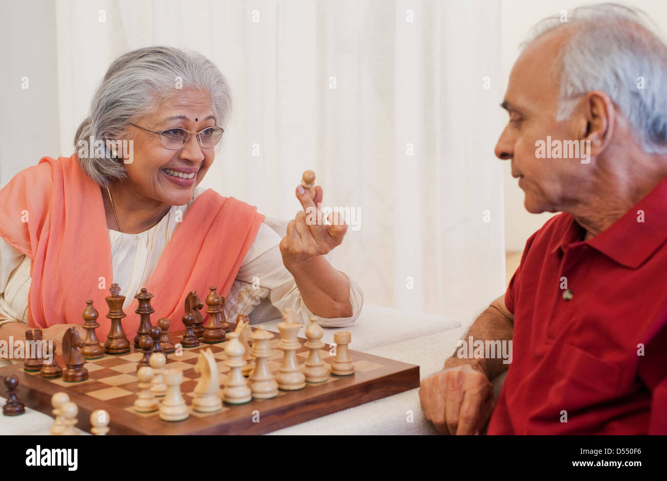 Two women playing checkers hi-res stock photography and images - Alamy