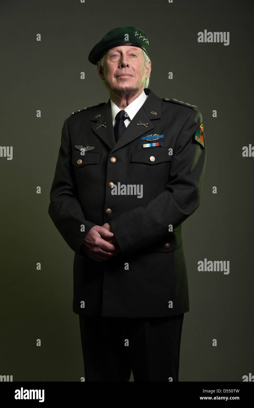 Military general in uniform wearing beret. Studio portrait Stock Photo ...