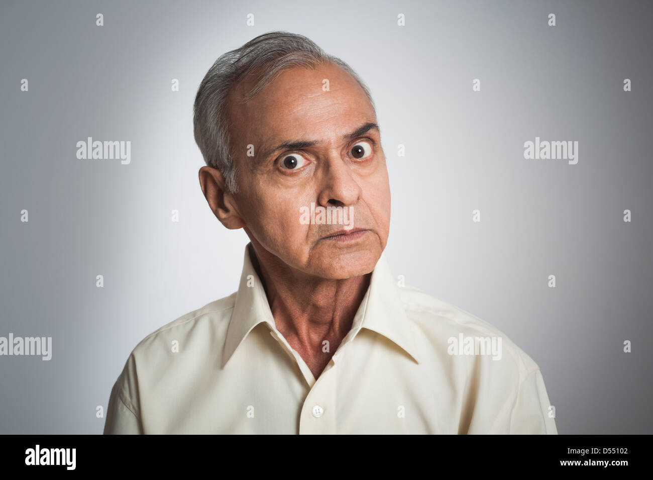 Portrait of a man looking aggressive Stock Photo - Alamy