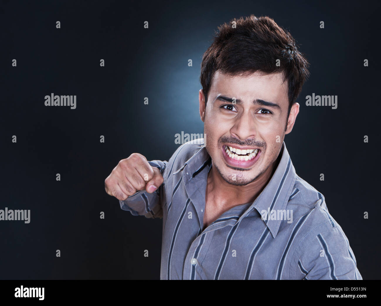 Angry man fist looking up hi-res stock photography and images - Alamy