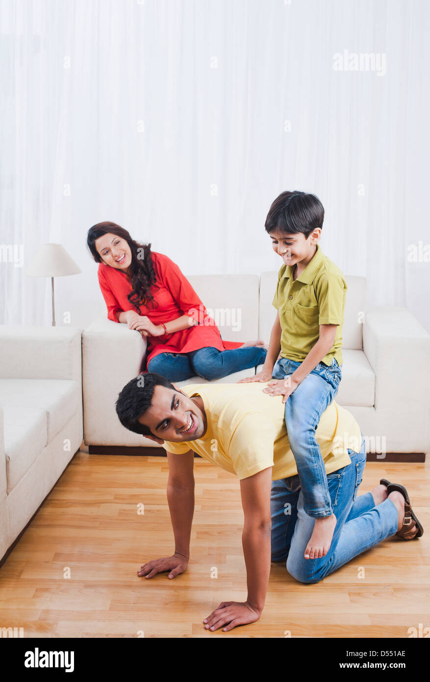 Indian father young son riding hi-res stock photography and images - Alamy