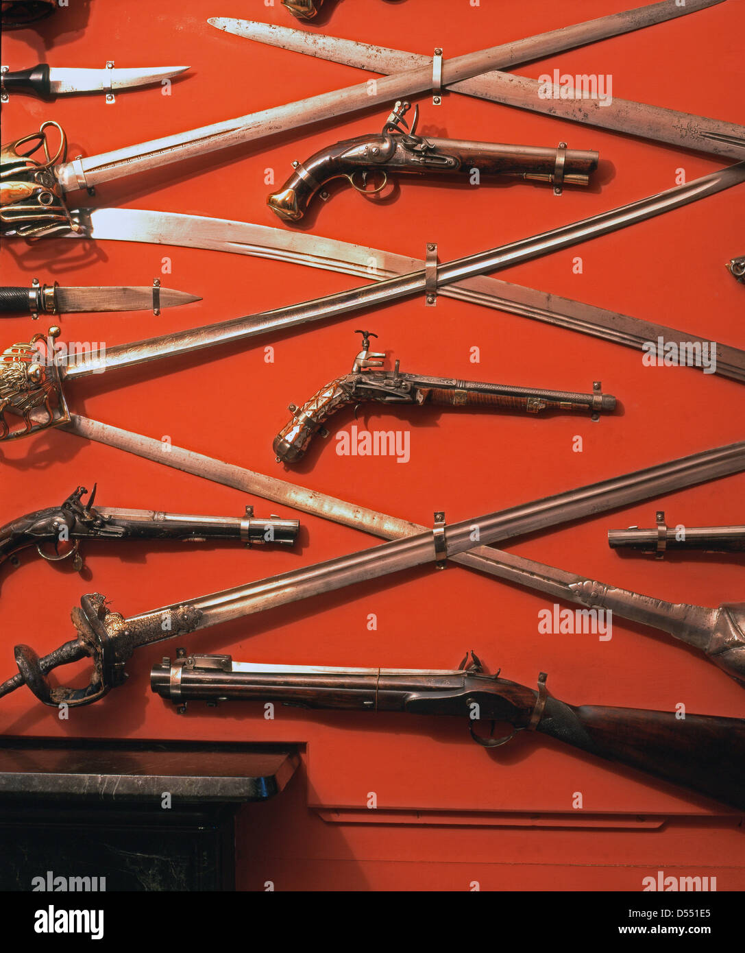 A display of antique swords and guns in Abbotsford House, formerly the ...