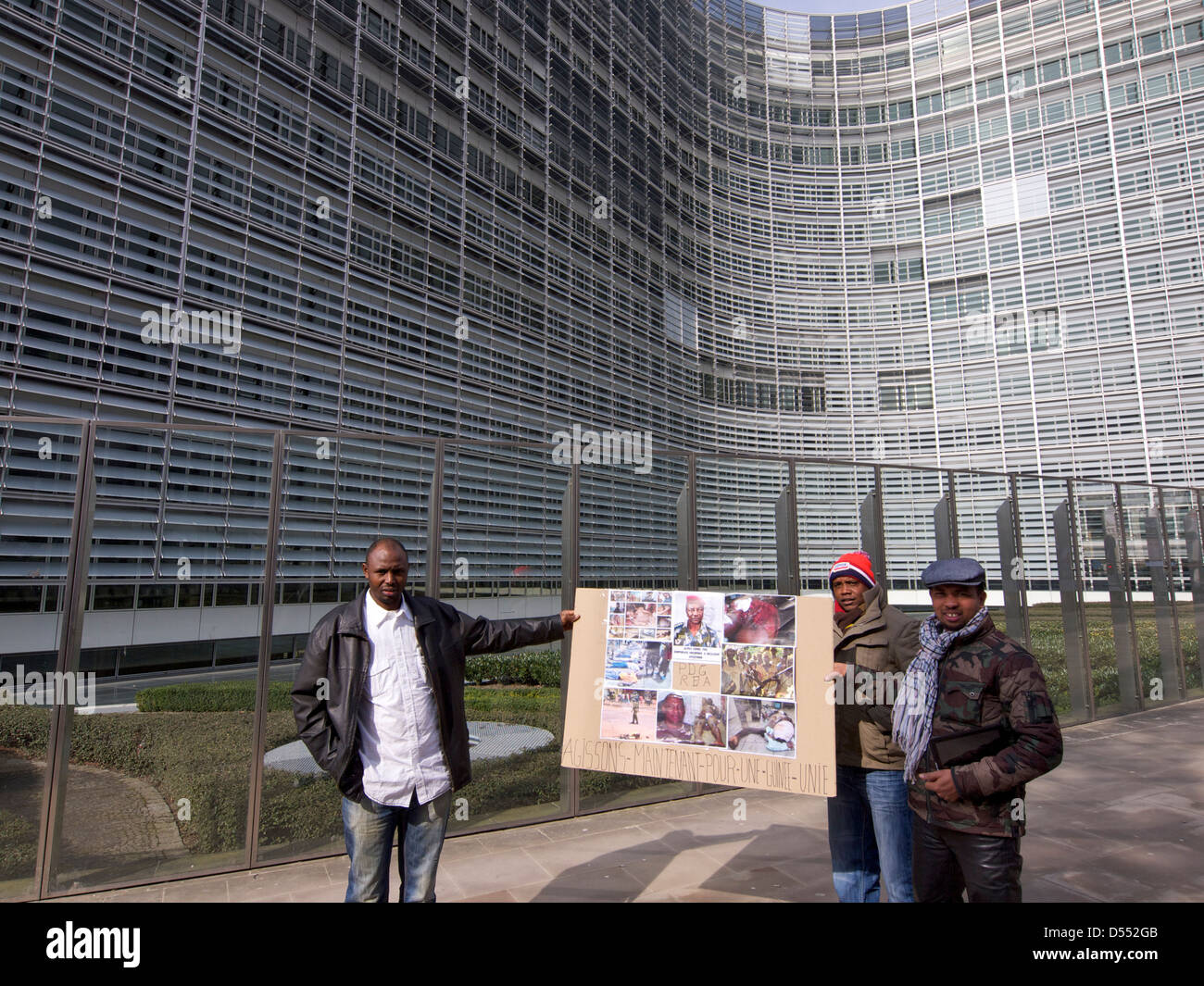 three men on their way to a protest against dictator Alpha Conde of ...