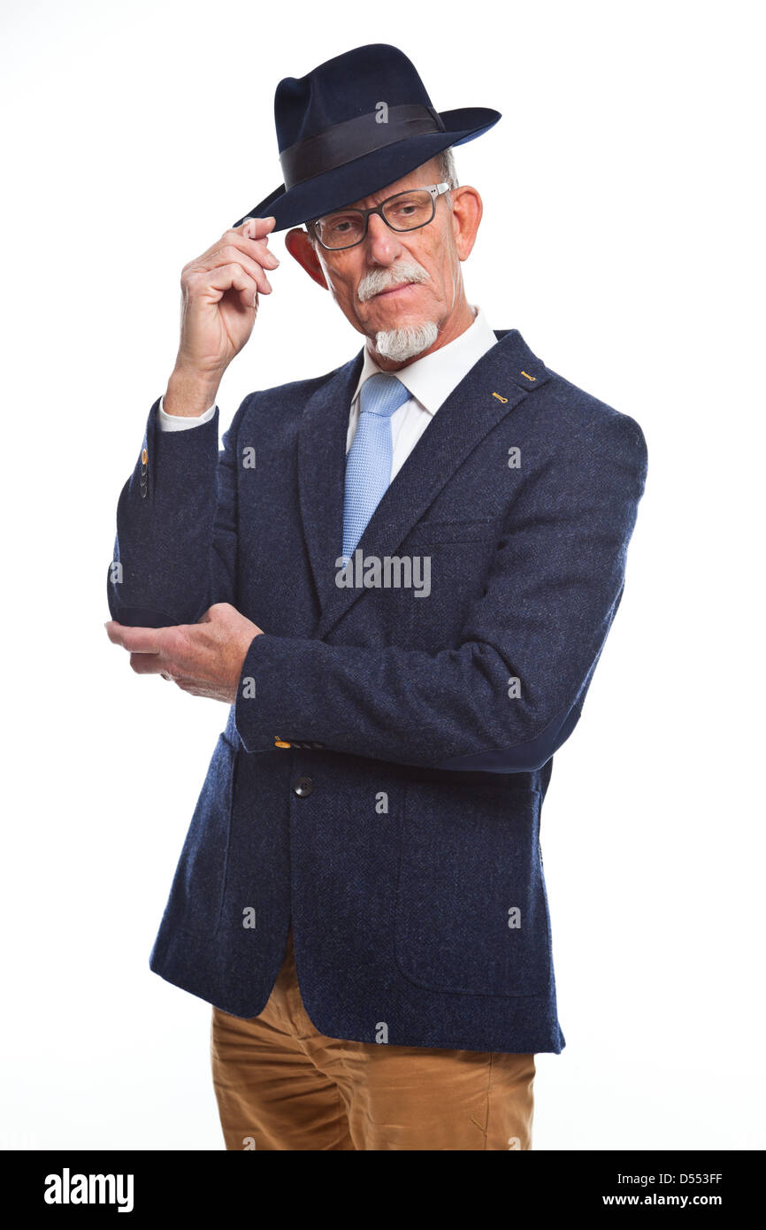 Serious well dressed senior man with hat. Isolated Stock Photo - Alamy