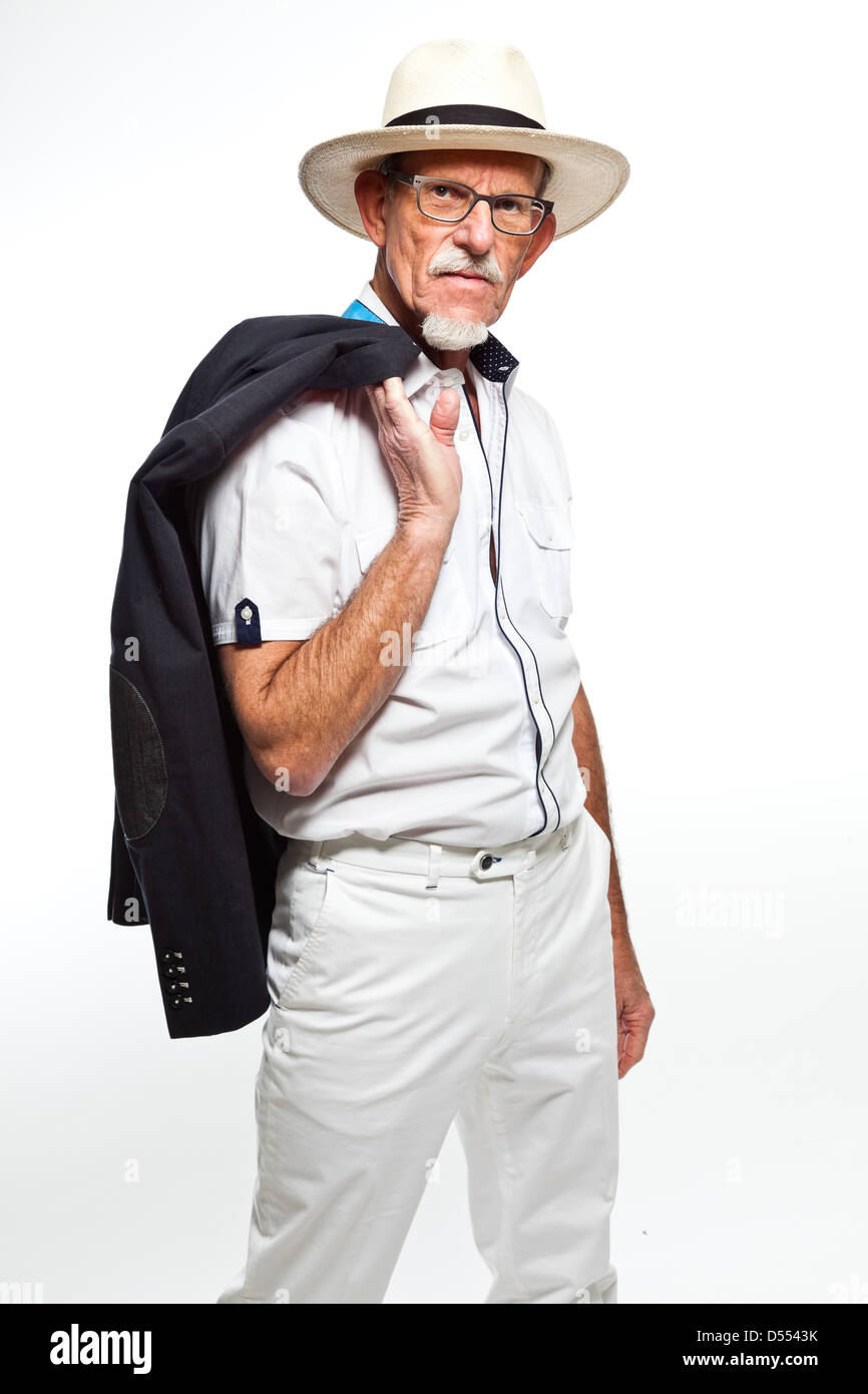 Well summer dressed senior man with hat. Isolated Stock Photo - Alamy