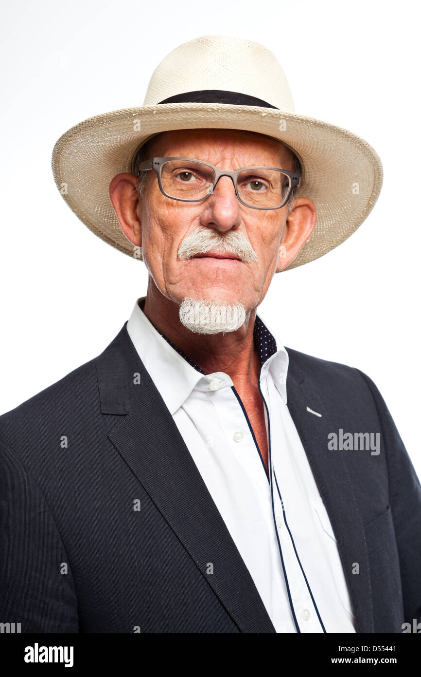 Well summer dressed senior man with hat. Isolated Stock Photo - Alamy
