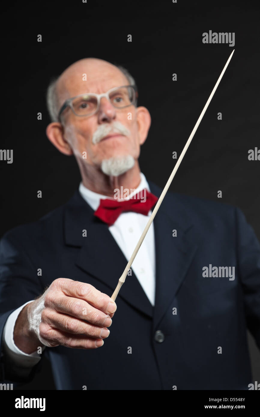 Young conductor holding baton hi-res stock photography and images - Alamy