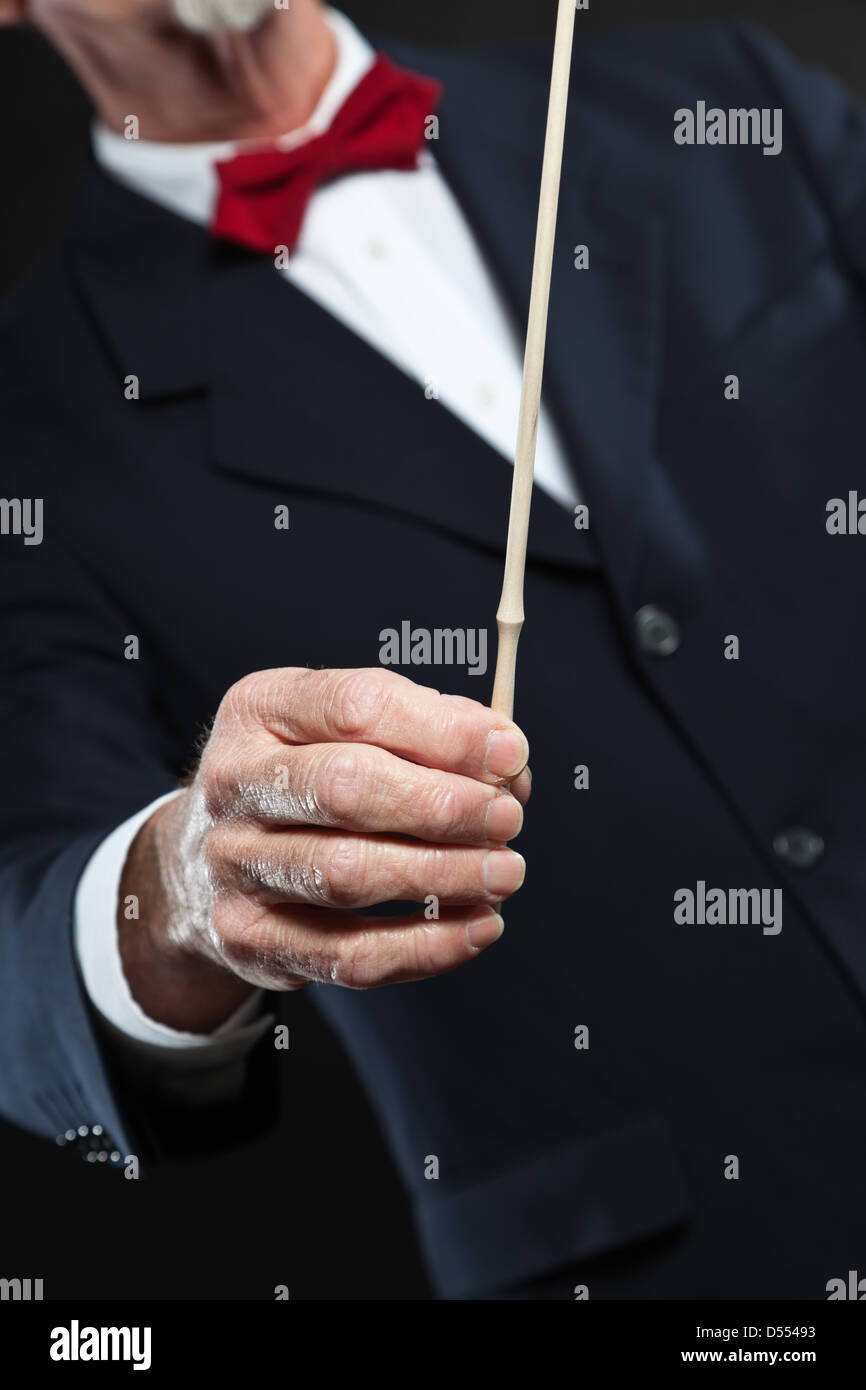Conductor conducting an orchestra isolated Stock Photo - Alamy