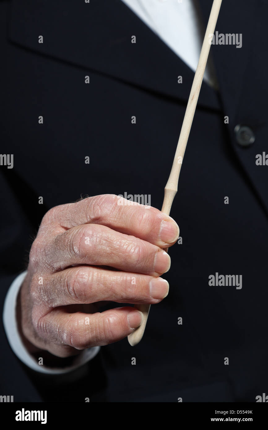 Conductor conducting an orchestra isolated Stock Photo - Alamy