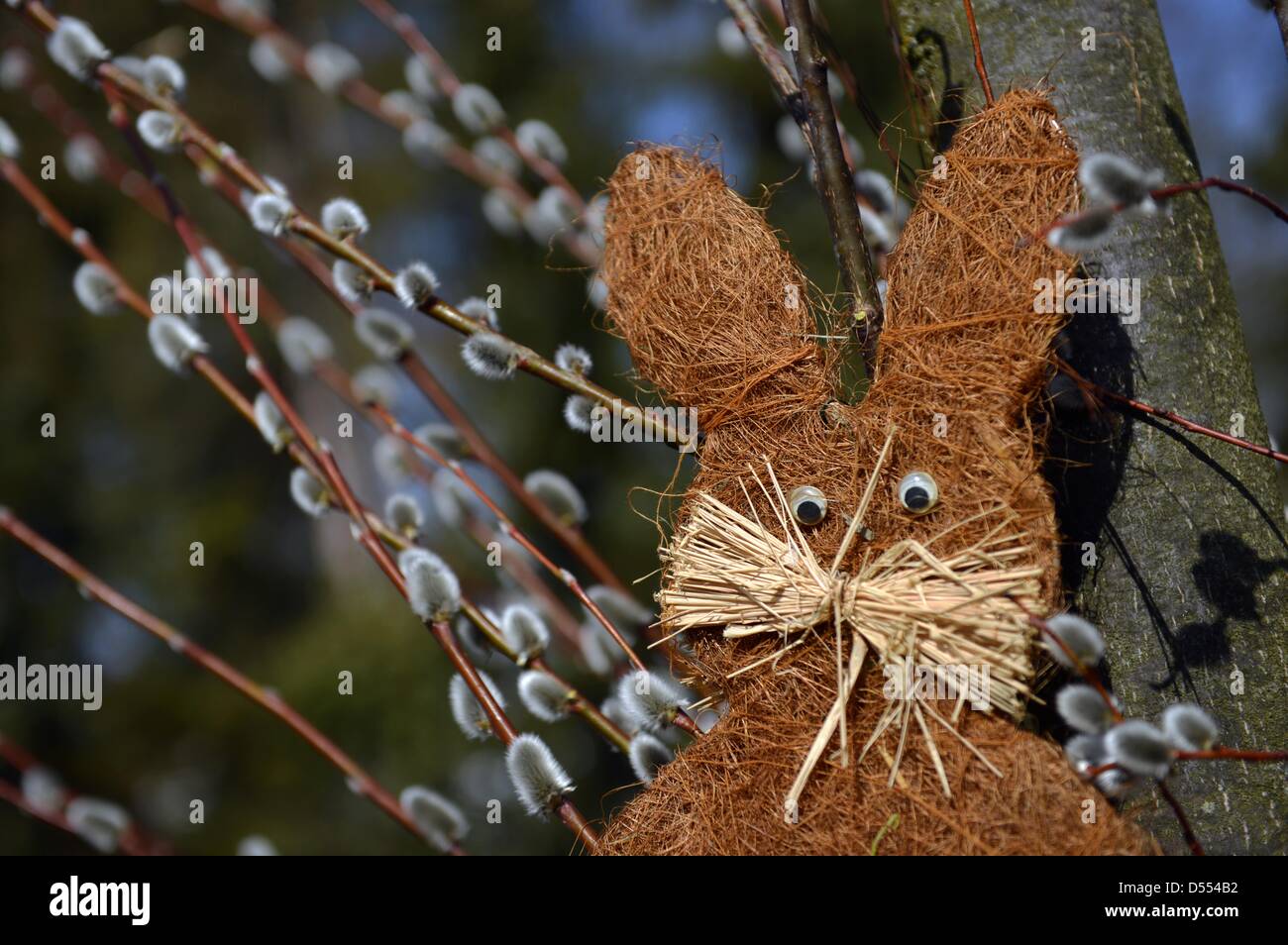 Easter Bunny decoration has been attached to branches of a bush in Bad ...
