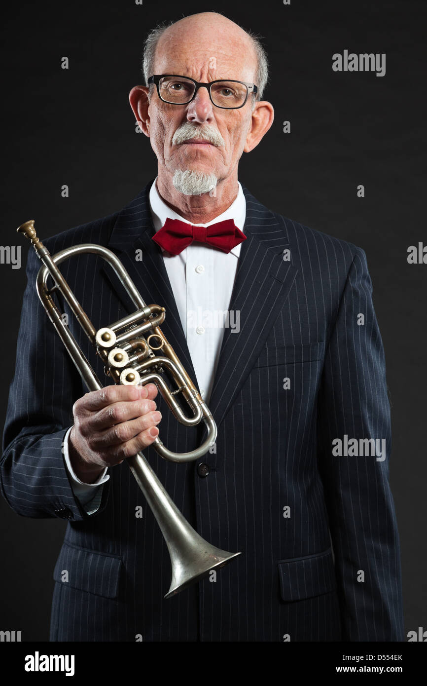 Trumpet trumpeter musician senior hi-res stock photography and images ...