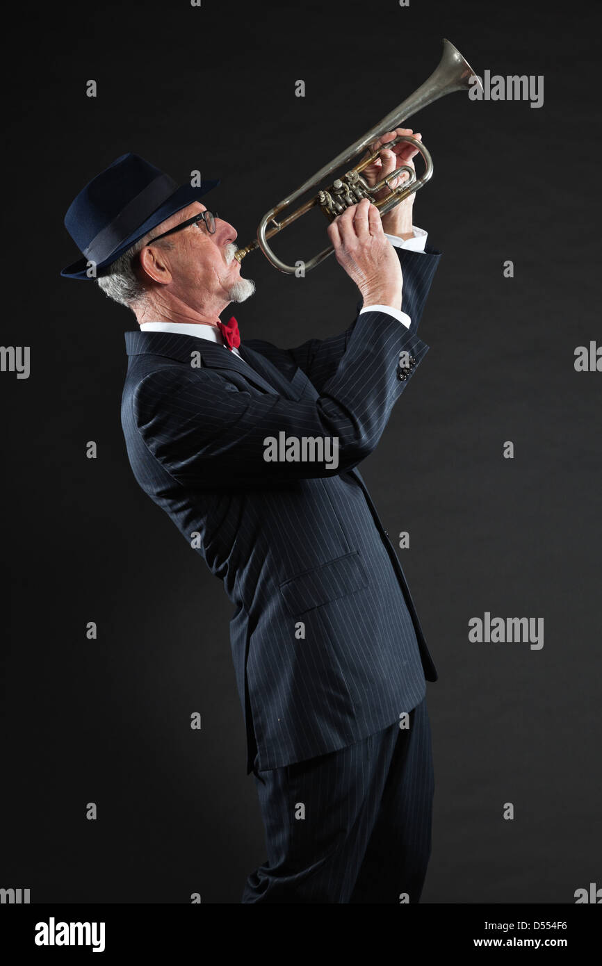 Trumpet trumpeter musician senior hi-res stock photography and images ...