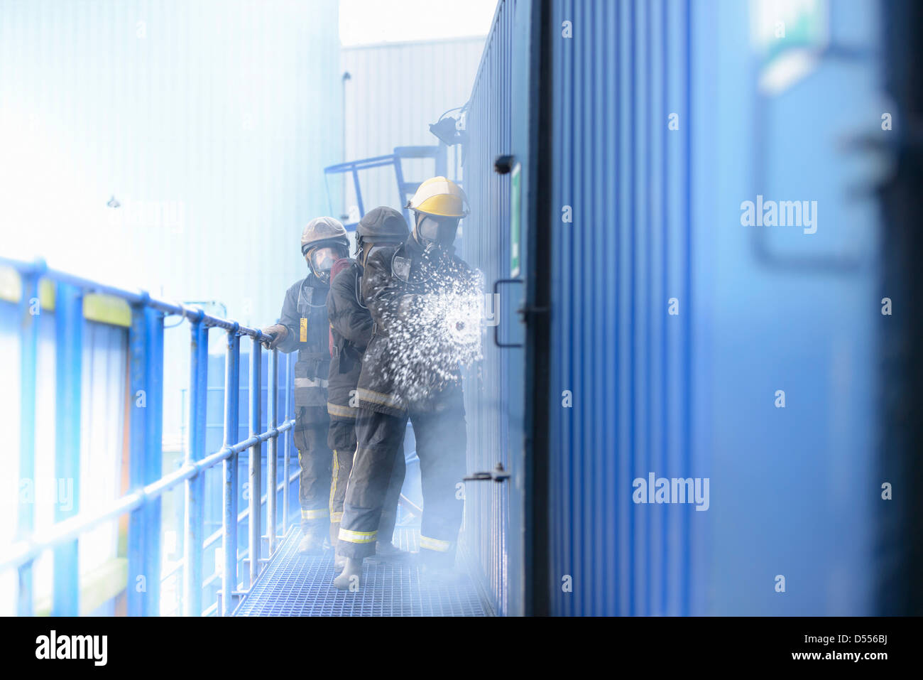 Firefighters in simulation training Stock Photo - Alamy