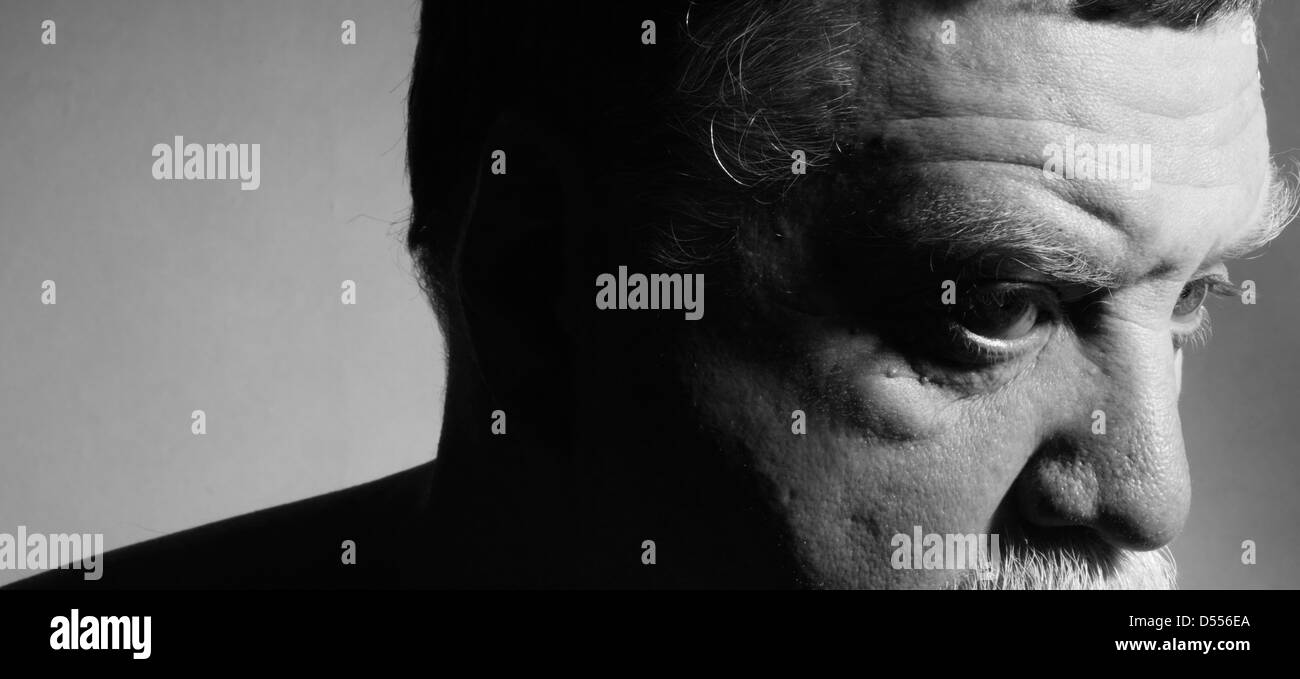 middle-aged man looks askance, black and white Stock Photo - Alamy