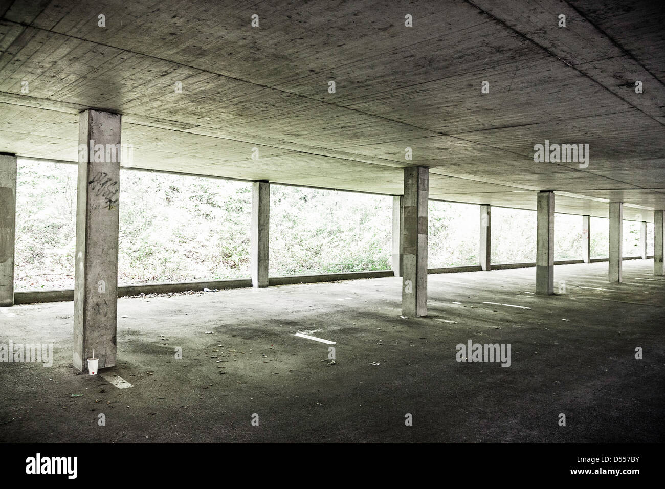 Pillars in empty parking structure Stock Photo - Alamy