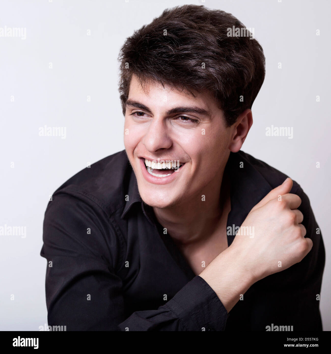 portrait of happy man laughing, studio shot Stock Photo - Alamy