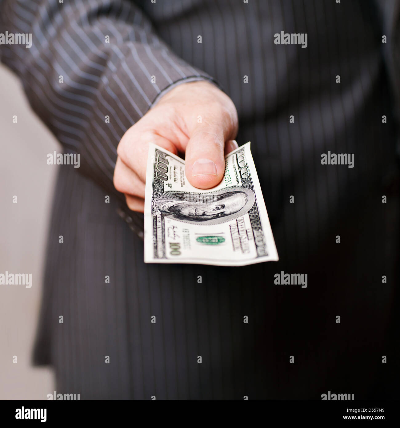 business man hand holding money isolated on white Stock Photo - Alamy