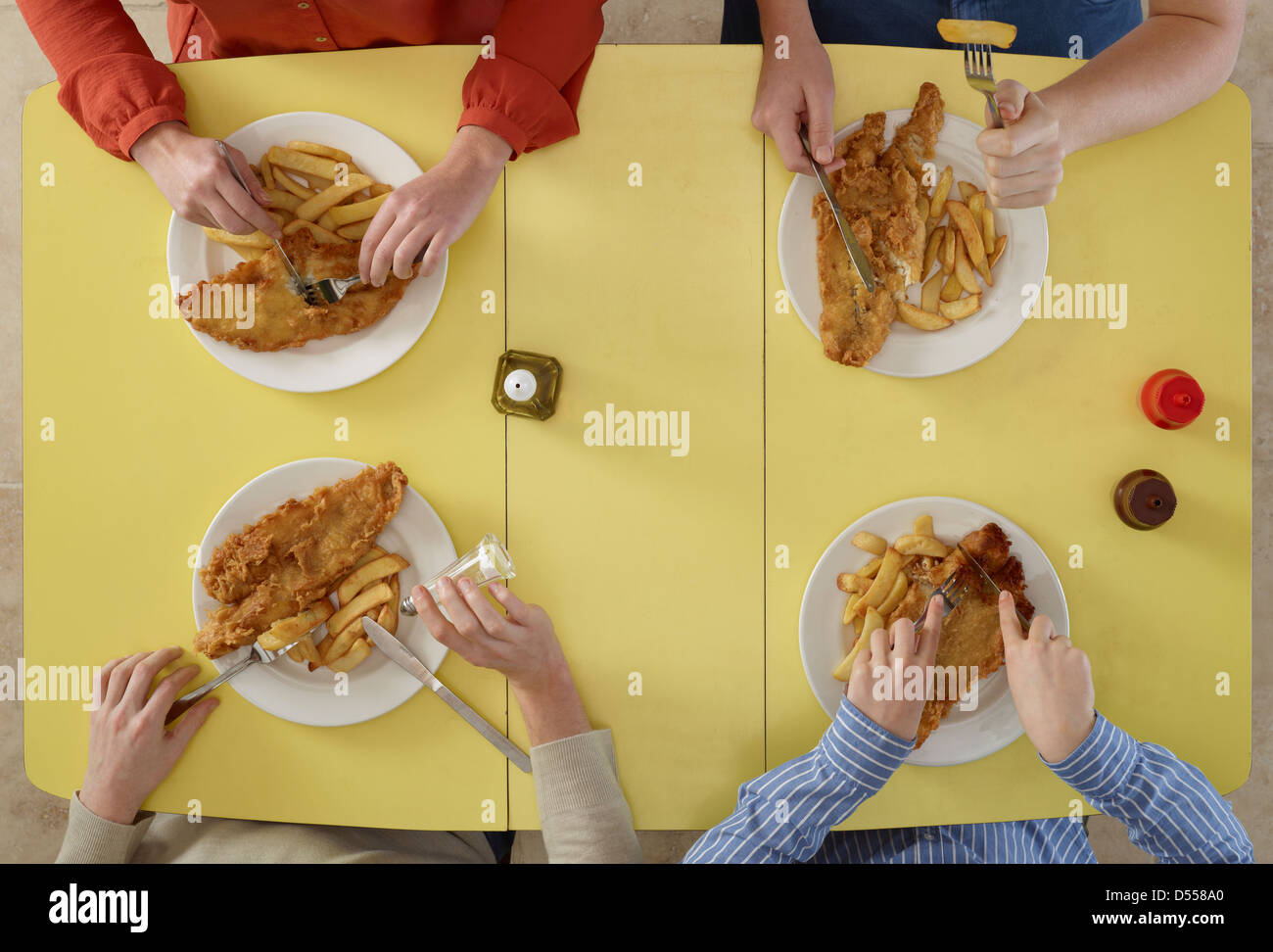 Overhead view of people eating together Stock Photo - Alamy