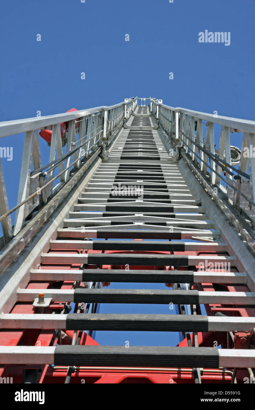 steps to Heaven by a fire truck with the autoscala in raised position ...