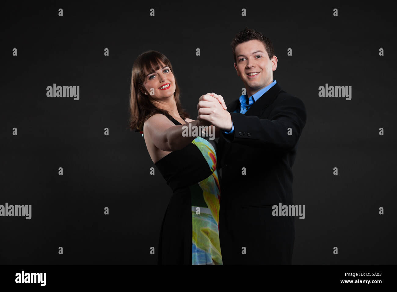 Romantic happy young couple dancing together. Stylish dressed Stock ...