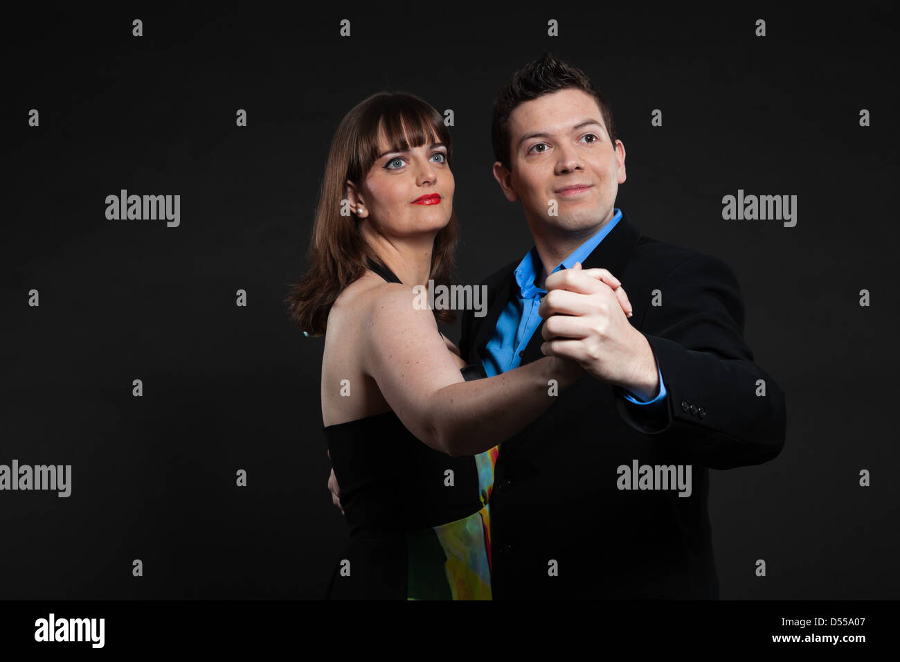 Romantic happy young couple dancing together. Stylish dressed Stock ...