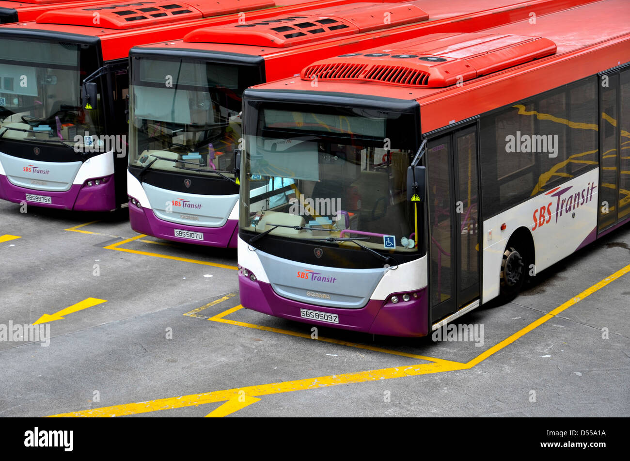 Public commuter buses at bus terminal Stock Photo - Alamy
