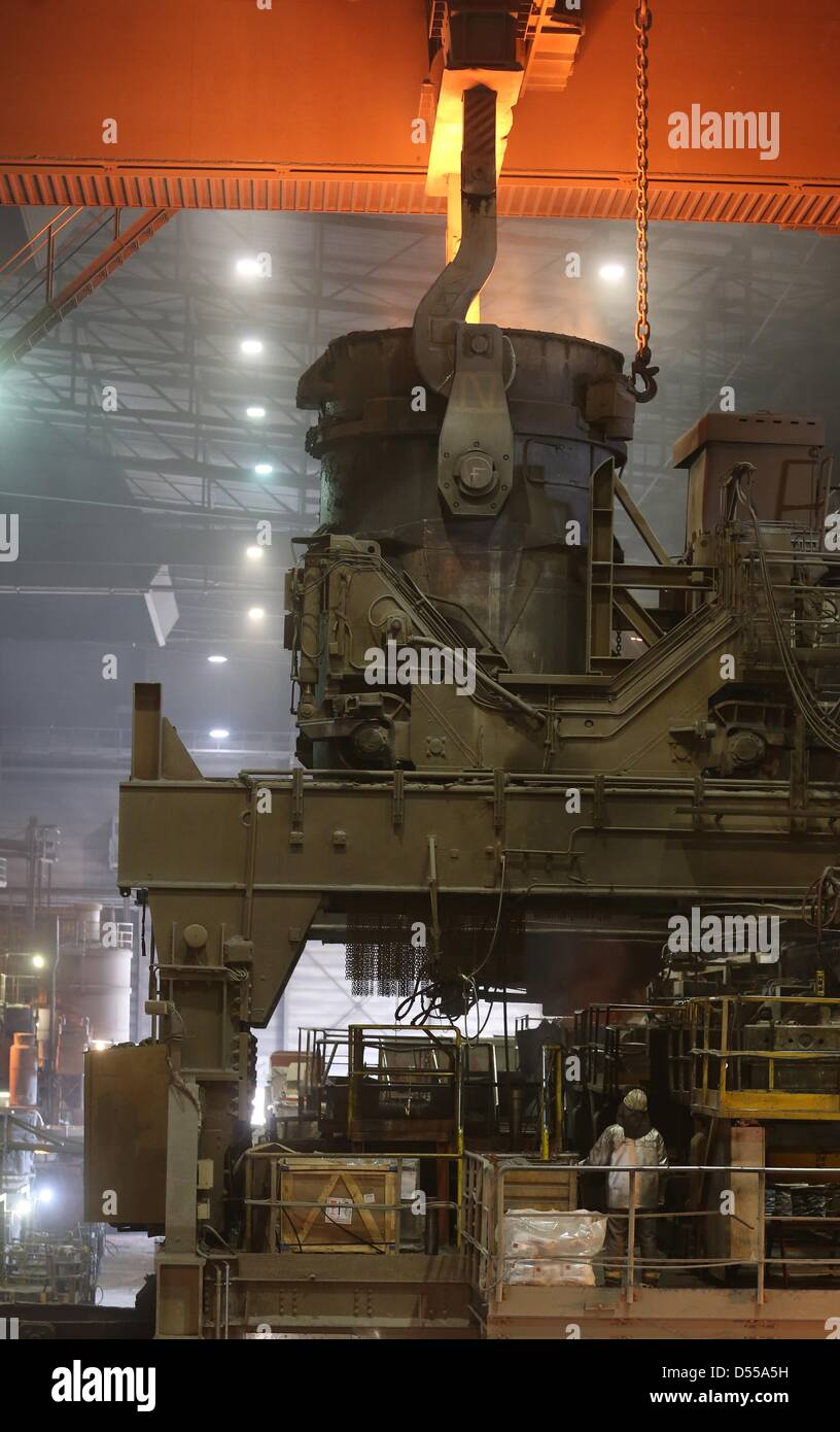 A pan with liquid steel from the new ladle furnace is lifted to the ...