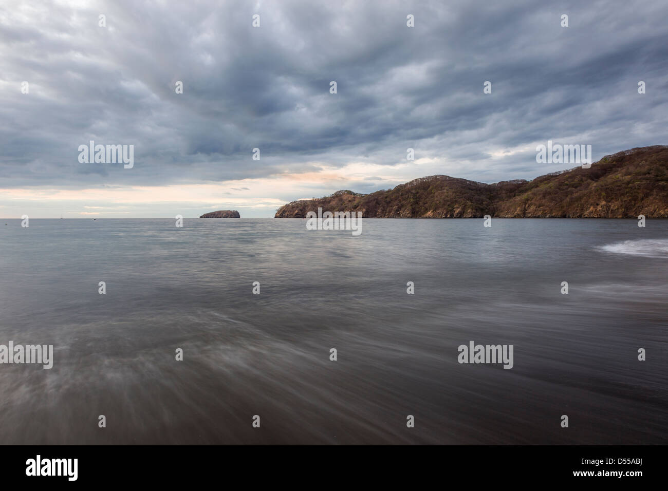 Waves wash along the shore of Coco Beach, Playas del Coco, Guanacaste ...