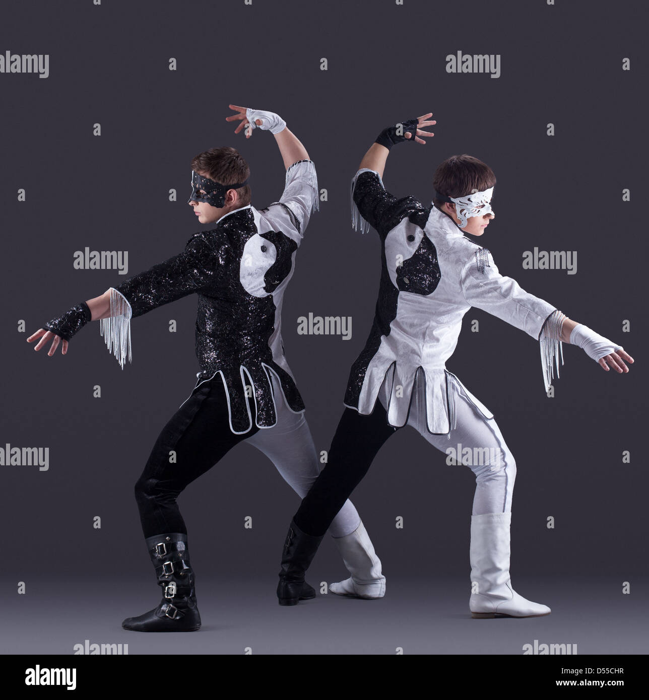 two men with carnival costumes posing in studio Stock Photo - Alamy