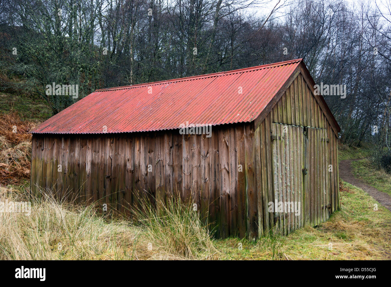 Wooden shed with corrugated iron roof at Loch Ruthven, an RSPB reserve ...