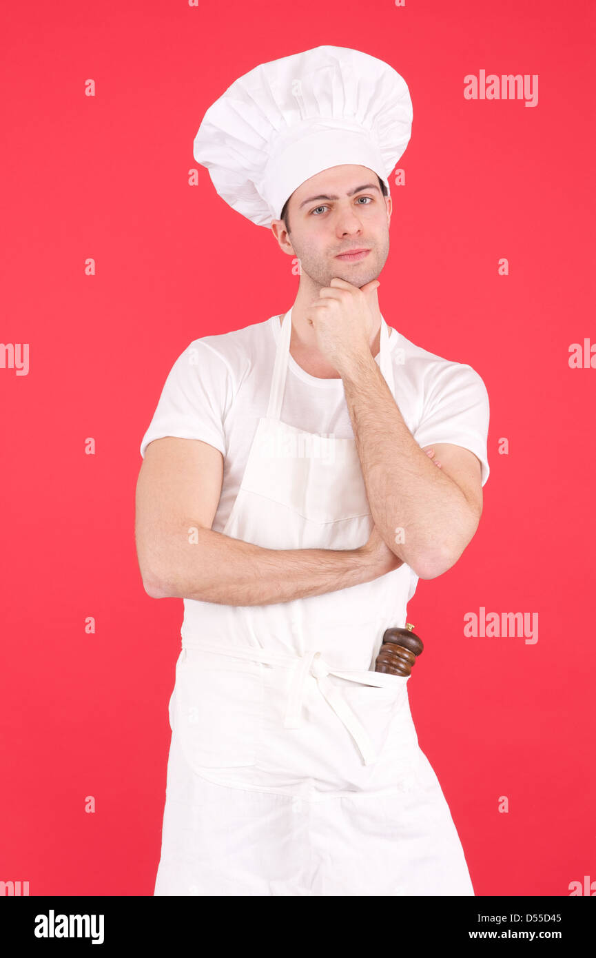 chef shot in red background Stock Photo - Alamy