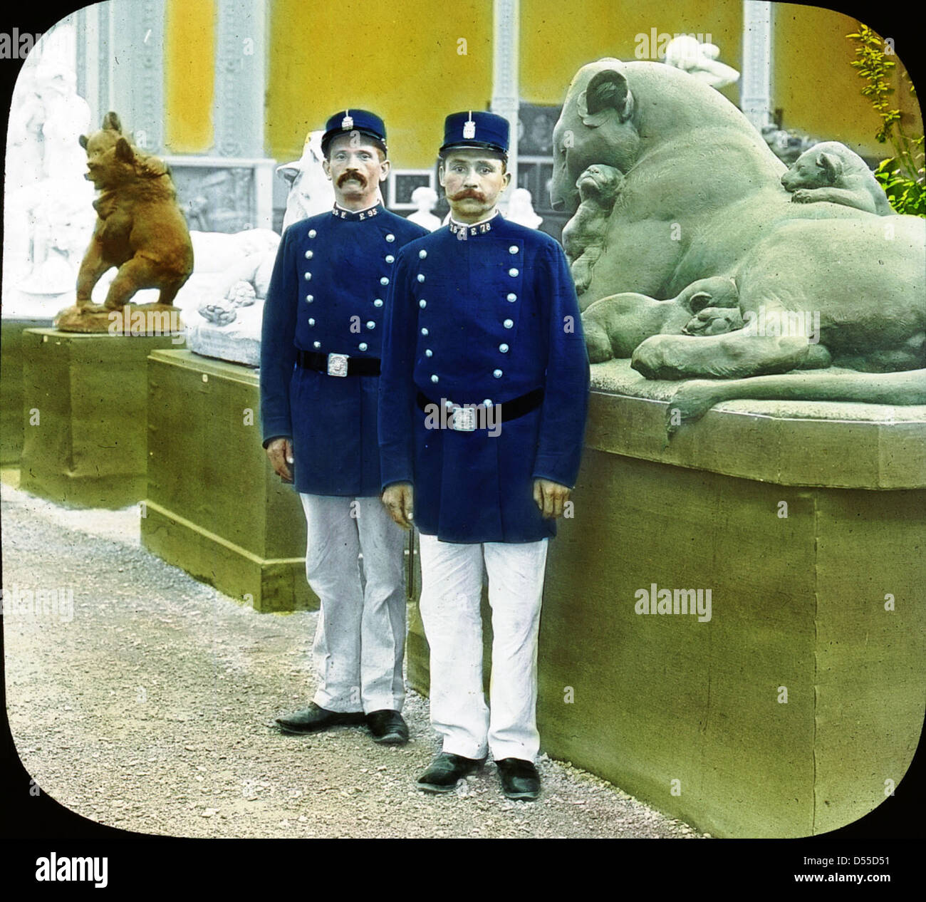 Police officers in uniform at the 1900 Paris Exposition, with hand ...