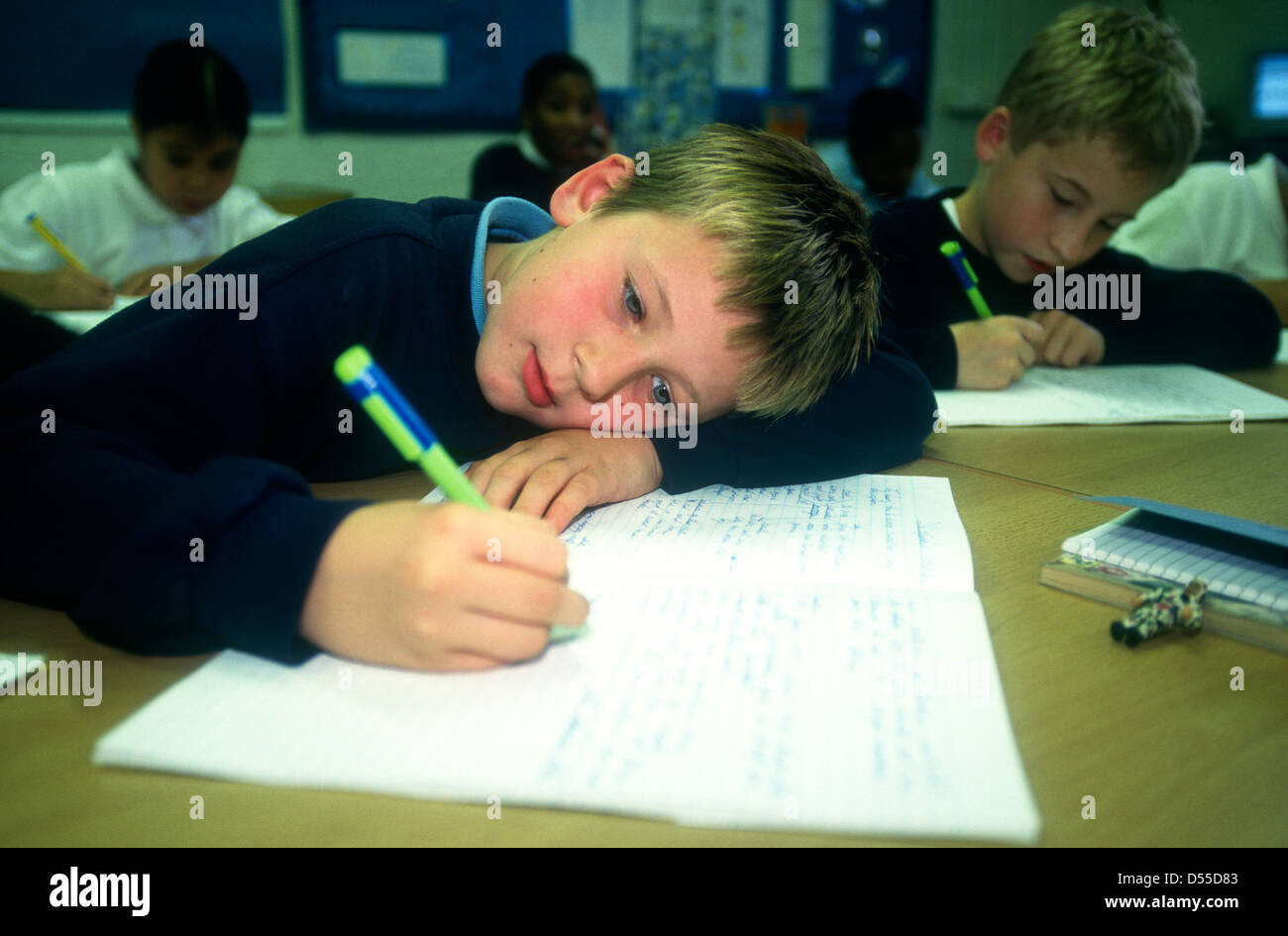 Uk children classroom writing hi-res stock photography and images - Alamy