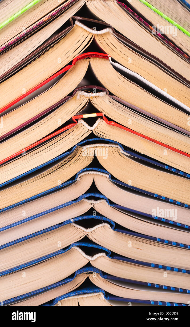 Stack of open books as background close-up Stock Photo - Alamy