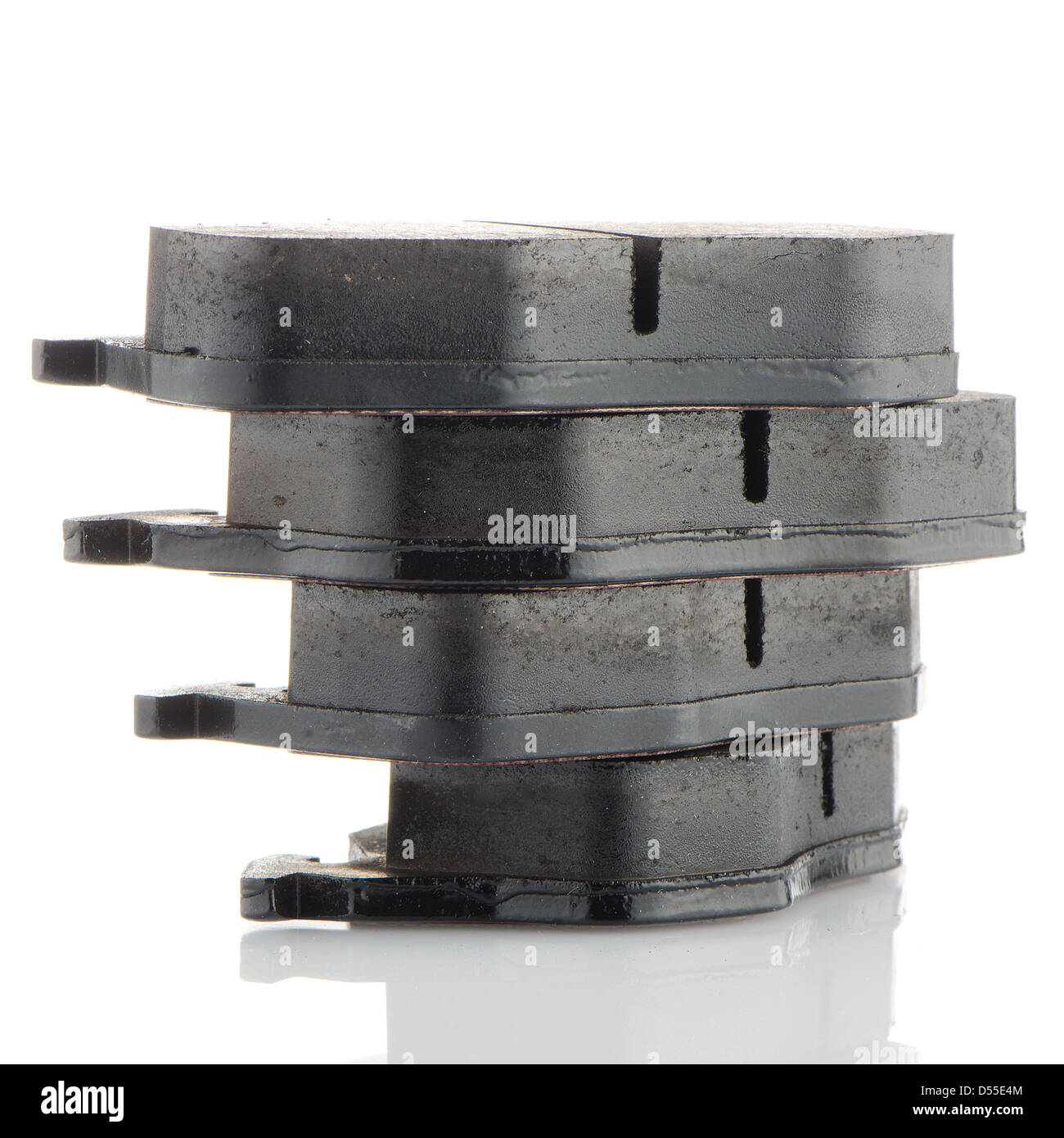 Car brake pads on white reflective background Stock Photo - Alamy
