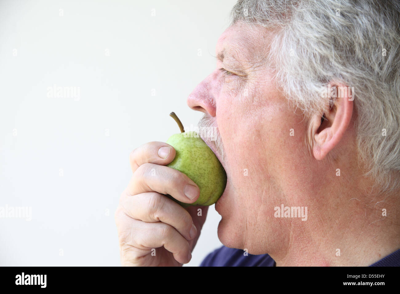 Man and pear hi-res stock photography and images - Alamy