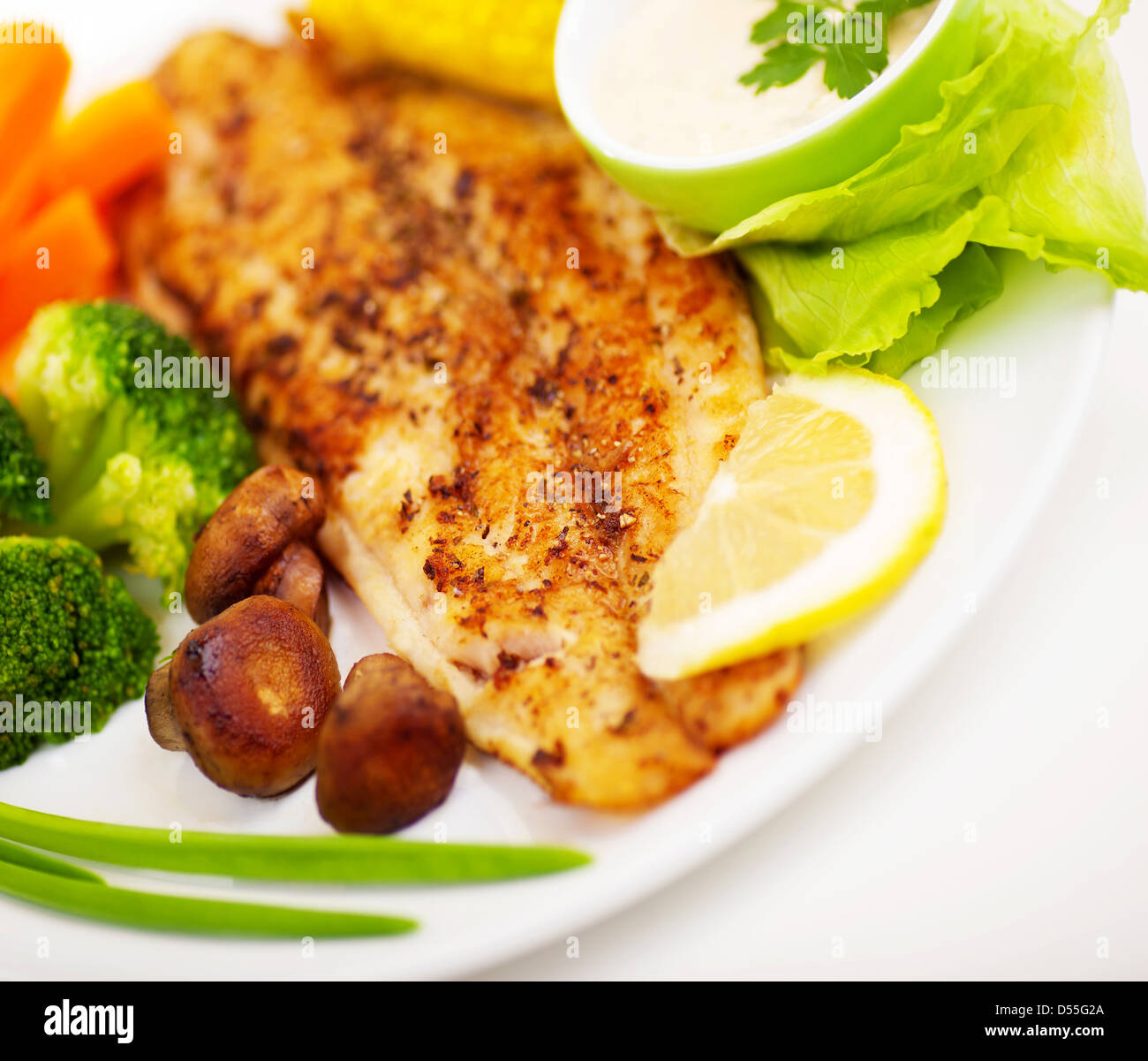 Tasty healthy fish fillet with steamed vegetables, healthy nutrition ...