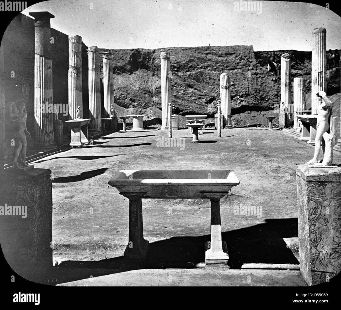 This image depicts the interior court or peristyle of a Roman house in ...