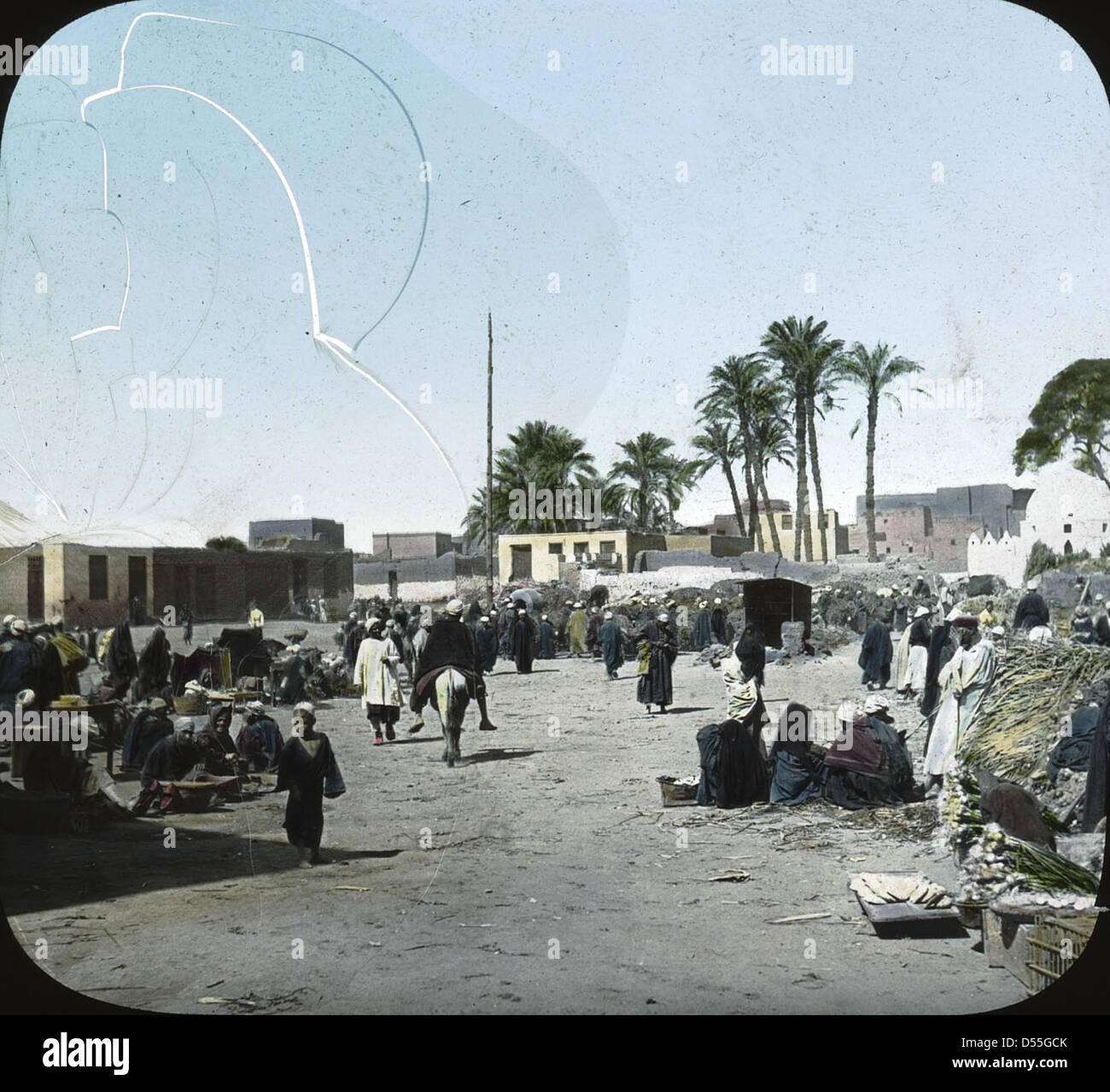 This image depicts the bustling market square of Assiut, Egypt ...