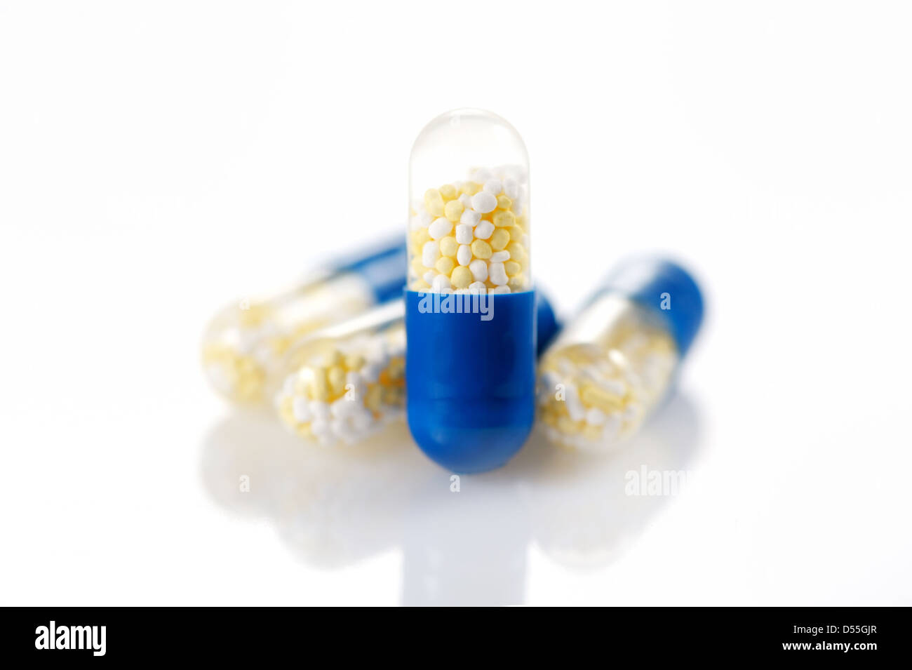 capsule pills isolated on white background Stock Photo - Alamy