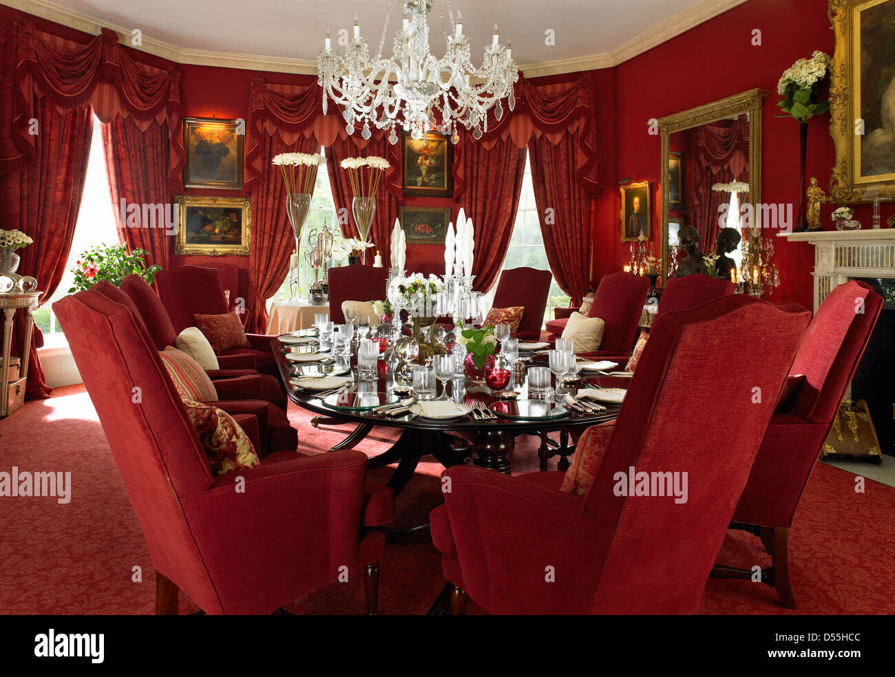 grand manor house red dining room Stock Photo - Alamy